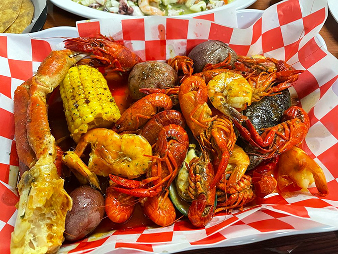 The seafood boil that launched a thousand food photos. Crawfish, corn, and potatoes swimming in spices that make you want to dive right in.