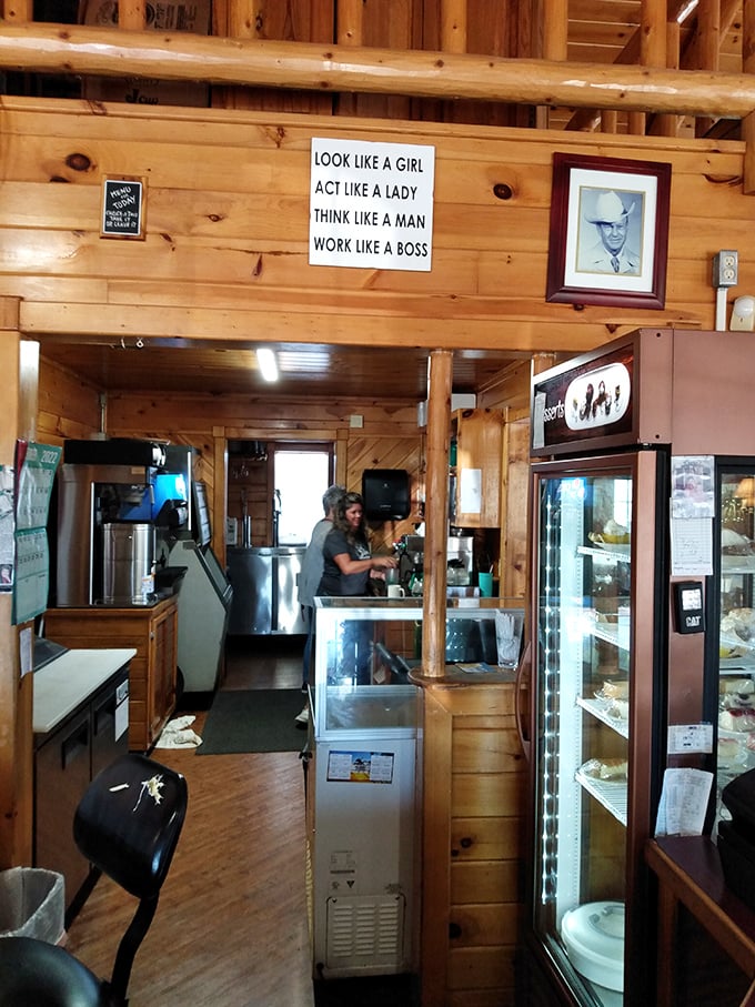Behind every great steak is a kitchen that means business. The sign above says it all—this place works like a boss.