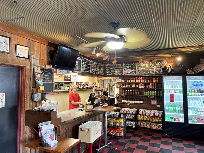 The market counter—where barbecue dreams come true and diet plans go to die. That smile says, "Yes, we can add extra sauce."