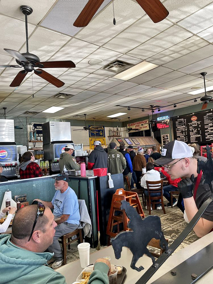 The lunch rush at Joe's—where CEOs and construction workers stand shoulder to shoulder, united by the universal language of exceptional barbecue.