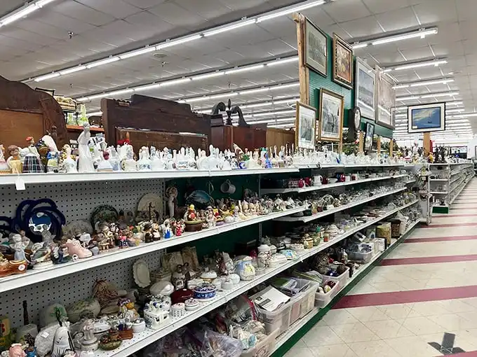 The figurine aisle: where childhood nightmares meet collector dreams and every single grandmother in Illinois once owned at least three of these ceramic creatures.