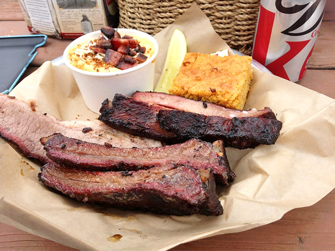 The three-meat platter with cornbread and mac & cheese—a combination that has launched thousands of food dreams and afternoon naps.