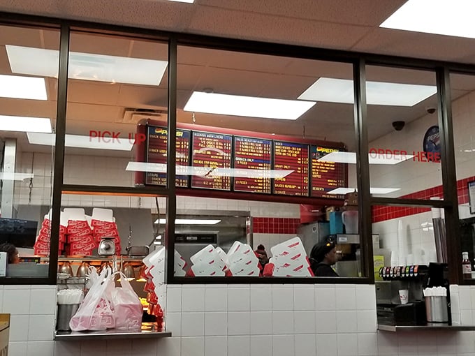 The ordering counter—that magical threshold where chicken dreams become delicious reality. Choose wisely, though all paths lead to happiness.