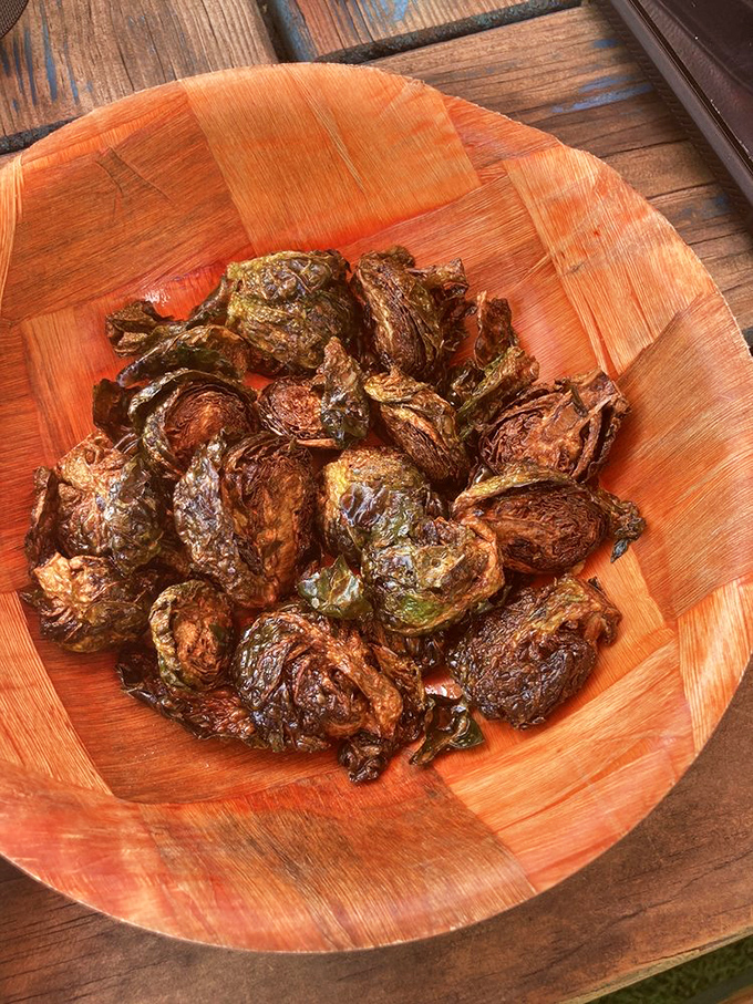 Brussels sprouts so crispy and caramelized they're converting vegetable skeptics one bite at a time – the little green orbs that could.