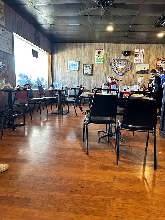 The dining room where memories are made between bites. Those wooden walls have absorbed decades of laughter, stories, and satisfied sighs.