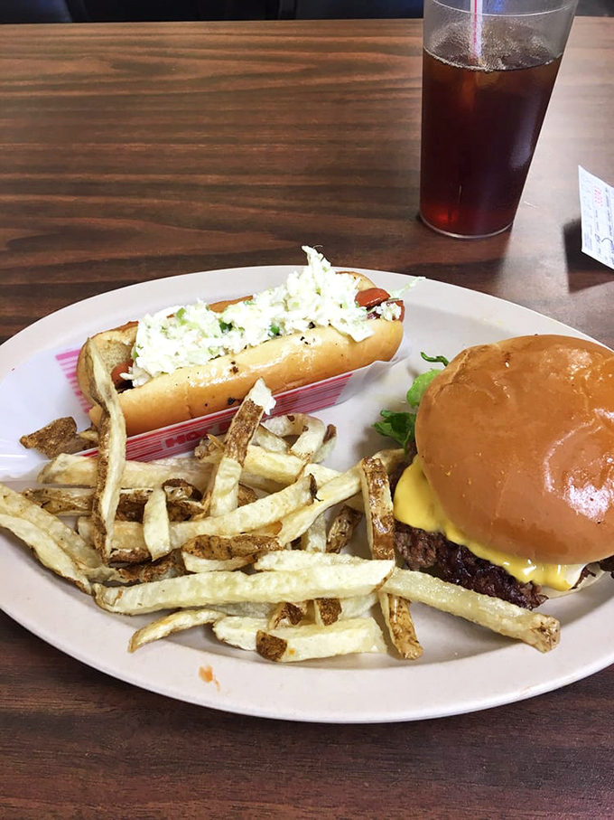 That hot dog isn't just playing second fiddle to the burger—it's starring in its own delicious production with a supporting cast of hand-cut fries.
