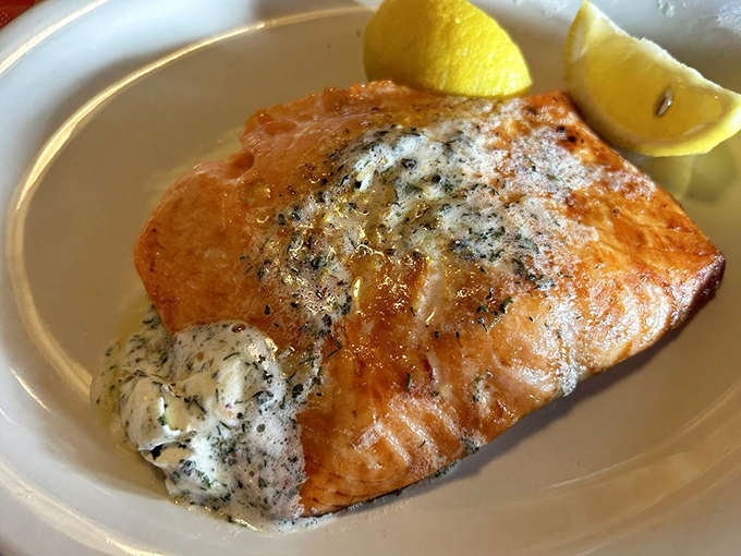 Even the salmon shines at this chicken palace, proving that sometimes the supporting actors deserve their own spotlight.