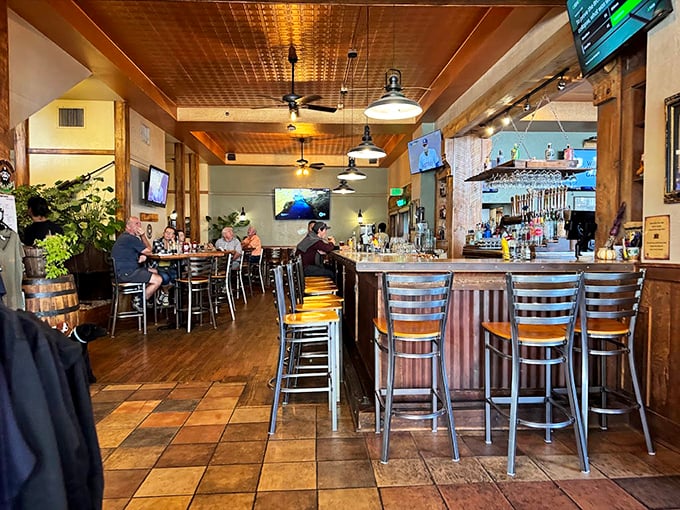 The bar isn't just where drinks are served—it's where stories are exchanged. Wood, warmth, and the promise of craft beer create the perfect mountain town gathering spot.