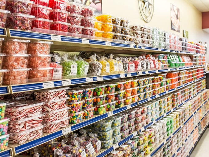 The candy section doesn't just satisfy sweet tooths—it's a time machine to childhood where happiness cost a quarter and came wrapped in wax paper.