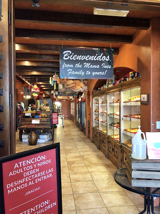 The sign promises "Bienvenidos"—and delivers. Mama Ines doesn't just serve food; it offers a sense of belonging with every bite. 