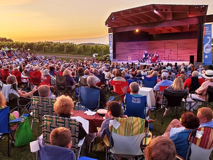 Summer concerts transform lakeside hills into natural amphitheaters where music, sunset views, and picnic baskets create the perfect evening trifecta.