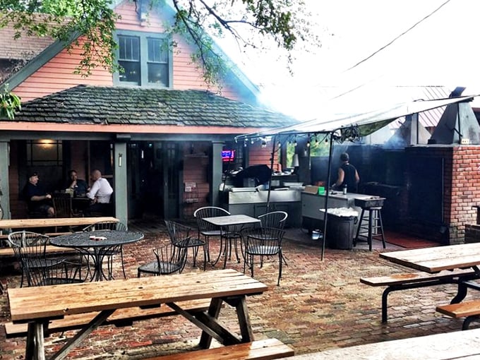 Outdoor dining where the smoke-scented air enhances every bite. This patio is where summer evenings reach their full potential—with barbecue in hand.