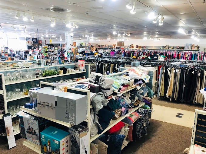 The interior view reveals the organized chaos that makes thrift shopping such an addictive treasure hunt for dedicated bargaineers.