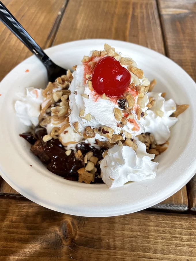 This brownie sundae isn't just dessert—it's therapy in a bowl. Hot fudge, whipped cream, and that cherry on top? Doctor's orders.