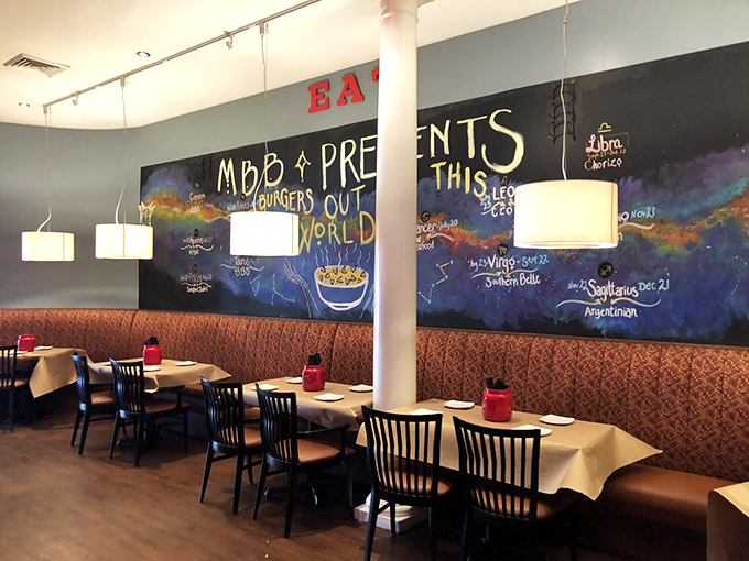 White columns and warm lighting create an unexpected elegance. Who says burger joints can't have architectural ambitions? 