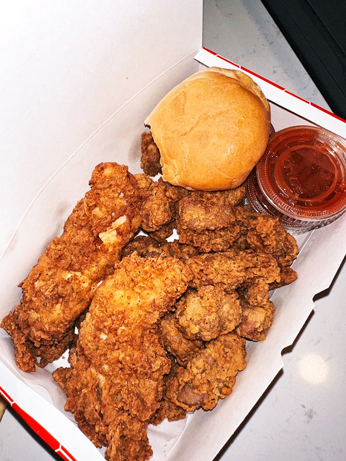 Gizzards and strips with that famous orange G-Sauce—proof that sometimes the most unassuming foods deliver the most unforgettable flavors.
