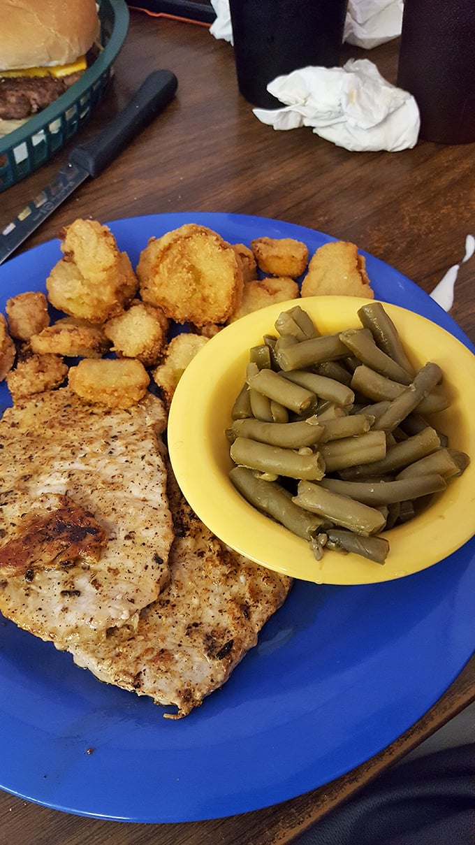 Who needs fancy when you've got hearty? Perfectly seasoned pork, golden hush puppies, and green beans cooked the way your grandmother made them.