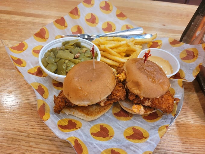 Those aren't just chicken sliders—they're handheld happiness, perfectly portioned for those who believe great things come in small packages (with a side of fries, naturally).