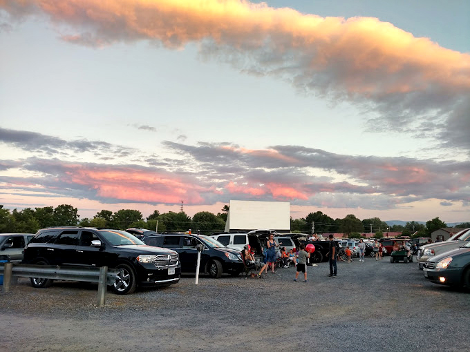 Dusk settles in as patrons arrange cars, chairs and snacks—the modern version of circling wagons around the communal storytelling fire.