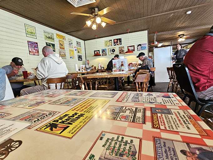 The dining room feels like your favorite uncle's den—if that uncle happened to have excellent taste in comfort food and a collection of vintage Americana. 