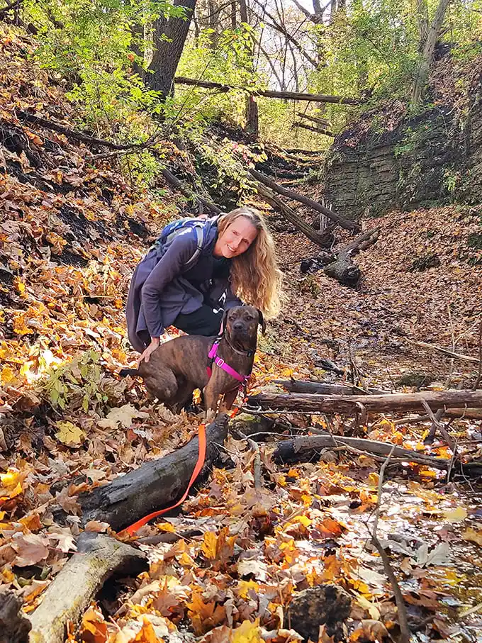 The joy of exploring limestone ravines with your four-legged hiking buddy—tails wagging and leaves crunching with each adventurous step.