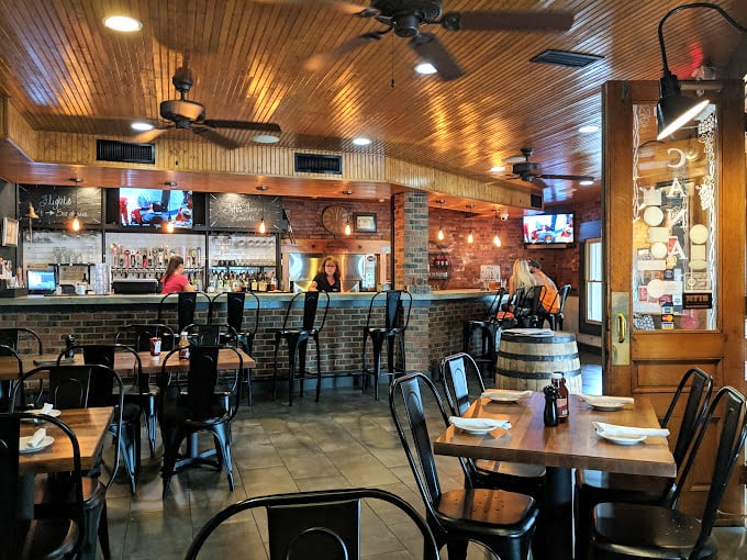 The warm wooden ceiling and brick walls create an atmosphere where calories don't count and diet plans go to die happily.