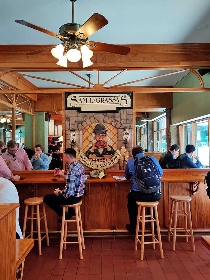 Lunchtime at Sam's: where Boston's diverse crowd unites in pursuit of the perfect sandwich experience.
