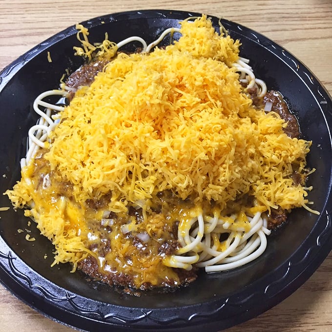 Cincinnati's famous way with spaghetti—a glorious mountain of cheese atop a savory foundation. Midwest comfort food that defies conventional pasta wisdom.