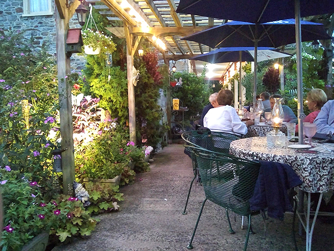 Outdoor dining where nature provides the ambiance and the kitchen provides the magic—a garden of earthly delights. 