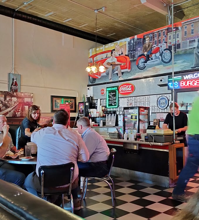 The universal language of burger appreciation being spoken fluently. Notice the focused expressions—that's what burger bliss looks like.