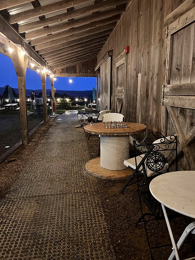 Evening magic under string lights—where summer nights become memories. Chess optional, but contemplating life's goodness is mandatory.
