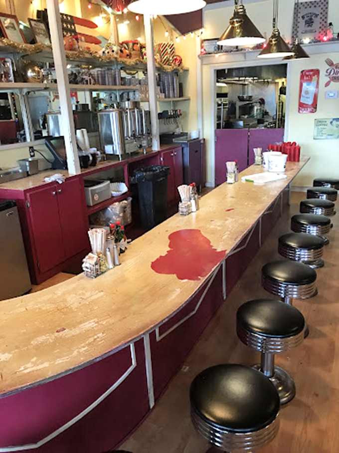 The classic American diner counter reimagined—where every stool represents the possibility of transcendent breakfast experiences just moments away.