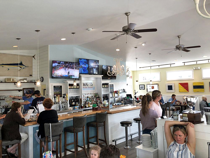 The bustling bar scene at Matt's proves that in Delaware, happy hour isn't just a time slot – it's a community gathering around great seafood.