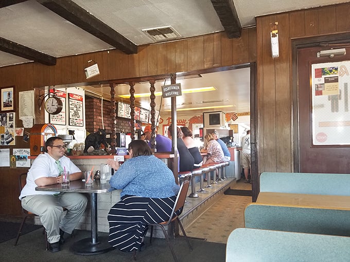 Where strangers become friends over frosted mugs—the dining room hums with conversation and the satisfied sounds of people eating well.
