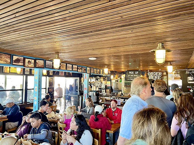 The bustling interior speaks volumes – when locals line up for seafood in a coastal city, you know you've found the real deal.