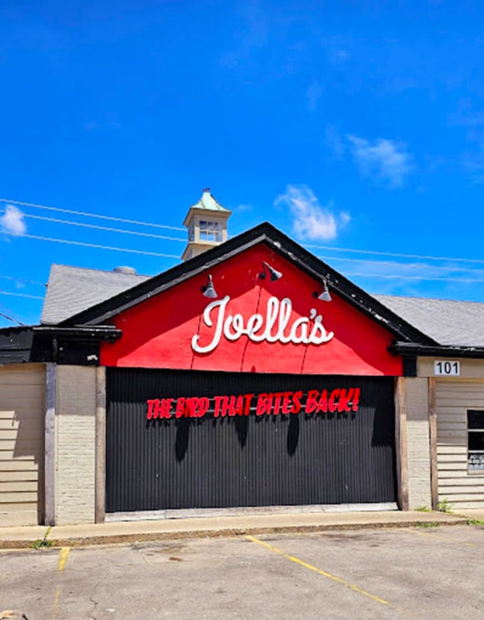 The red facade and bold lettering aren't just signage—they're a beacon for flavor seekers, standing proud against the Kentucky sky like a spicy lighthouse.