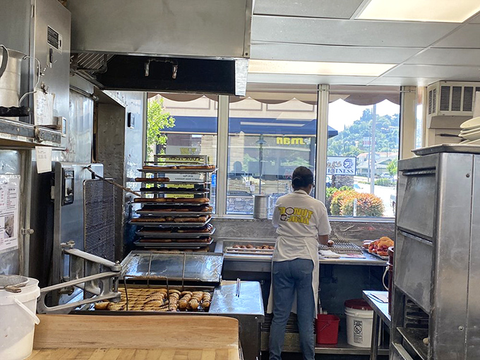 The kitchen—sacred ground where simple ingredients transform into legendary treats that have kept Californians coming back for decades.