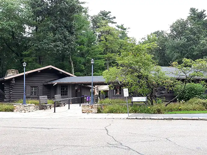 The lodge welcomes visitors like an old friend with stories to tell. Its log walls have witnessed decades of happy campers seeking woodland refuge.