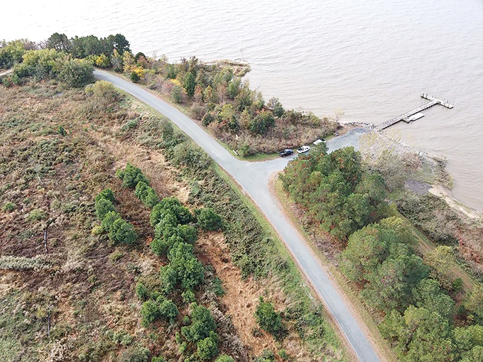 From above, the island reveals its true character—a winding road embraced by wilderness, leading adventurers to hidden Chesapeake treasures.