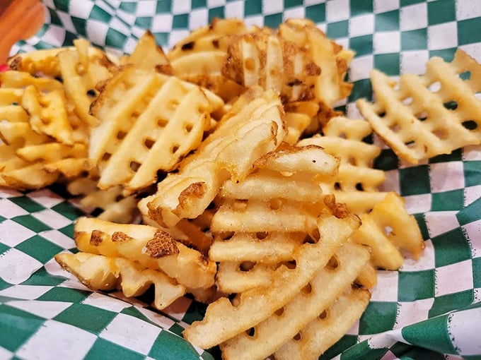 Waffle fries: the textural wonderland that proves sometimes the supporting actor steals the scene with golden, crispy charisma.