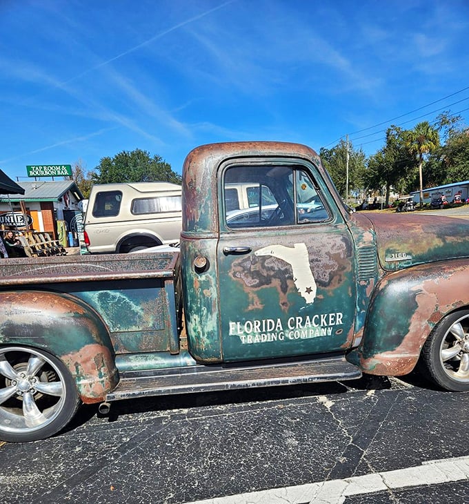 This weathered Florida Cracker Trading Company truck isn't just decoration—it's a rusty time machine to the state's hardworking past.