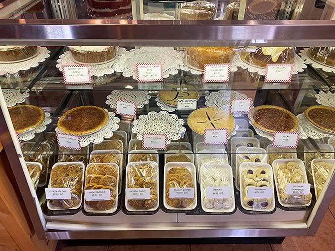 The display case of destiny—where pies, cookies, and pastries compete for your attention like contestants on a particularly delicious reality show.