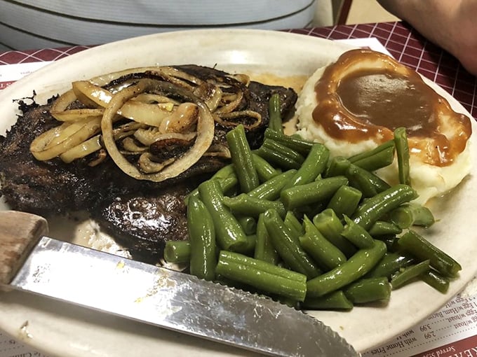 Liver and onions with green beans and mashed potatoes—a plate that separates the culinary tourists from the true food adventurers.