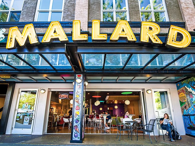 Mallard Ice Cream's vibrant storefront promises scoops of joy, where artisanal flavors meet small-town prices in frozen harmony.