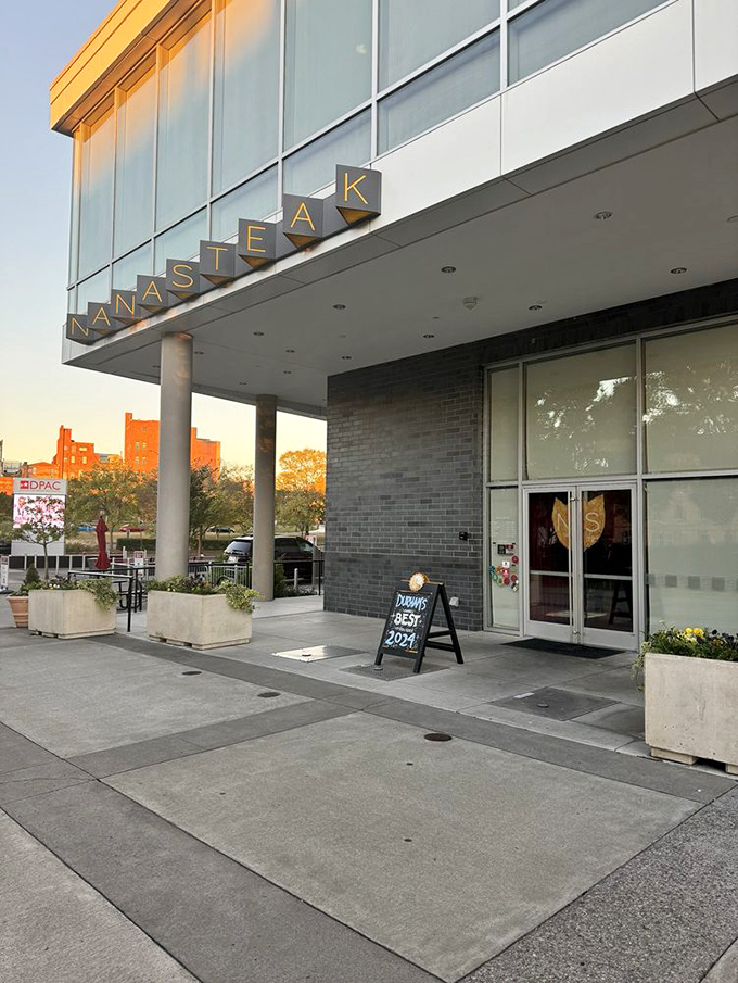 NanaSteak's exterior at golden hour – that magical moment when the day's obligations end and the evening's pleasures begin.