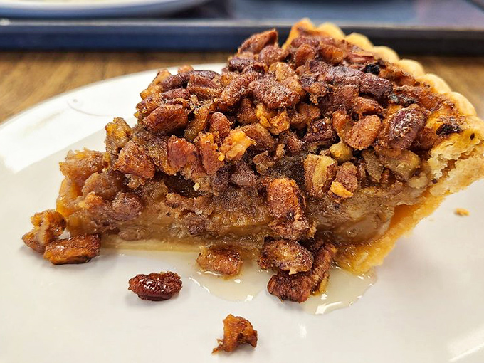 Pecan pie that could make a Southern grandmother nod in approval—sweet, gooey, and crowned with perfectly toasted nuts.