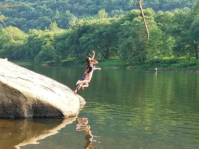 The ultimate Pennsylvania air conditioning: a plunge into the cool river waters. No app, subscription, or electricity required—just pure, refreshing joy.
