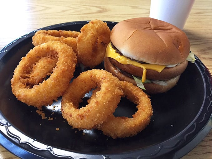 The burger-and-rings combo that's launched a thousand "just one more bite" promises. A study in textural contrasts and flavor harmony.
