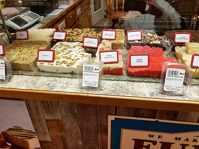 The dessert case displays squares of fudge and toffee like edible artwork – resistance is futile, and honestly, why would you even try?