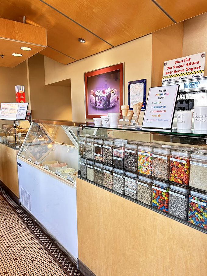 Toppings galore line the counter like jewels in a treasure chest—sprinkles, candies, and nuts just waiting to transform good ice cream into greatness.